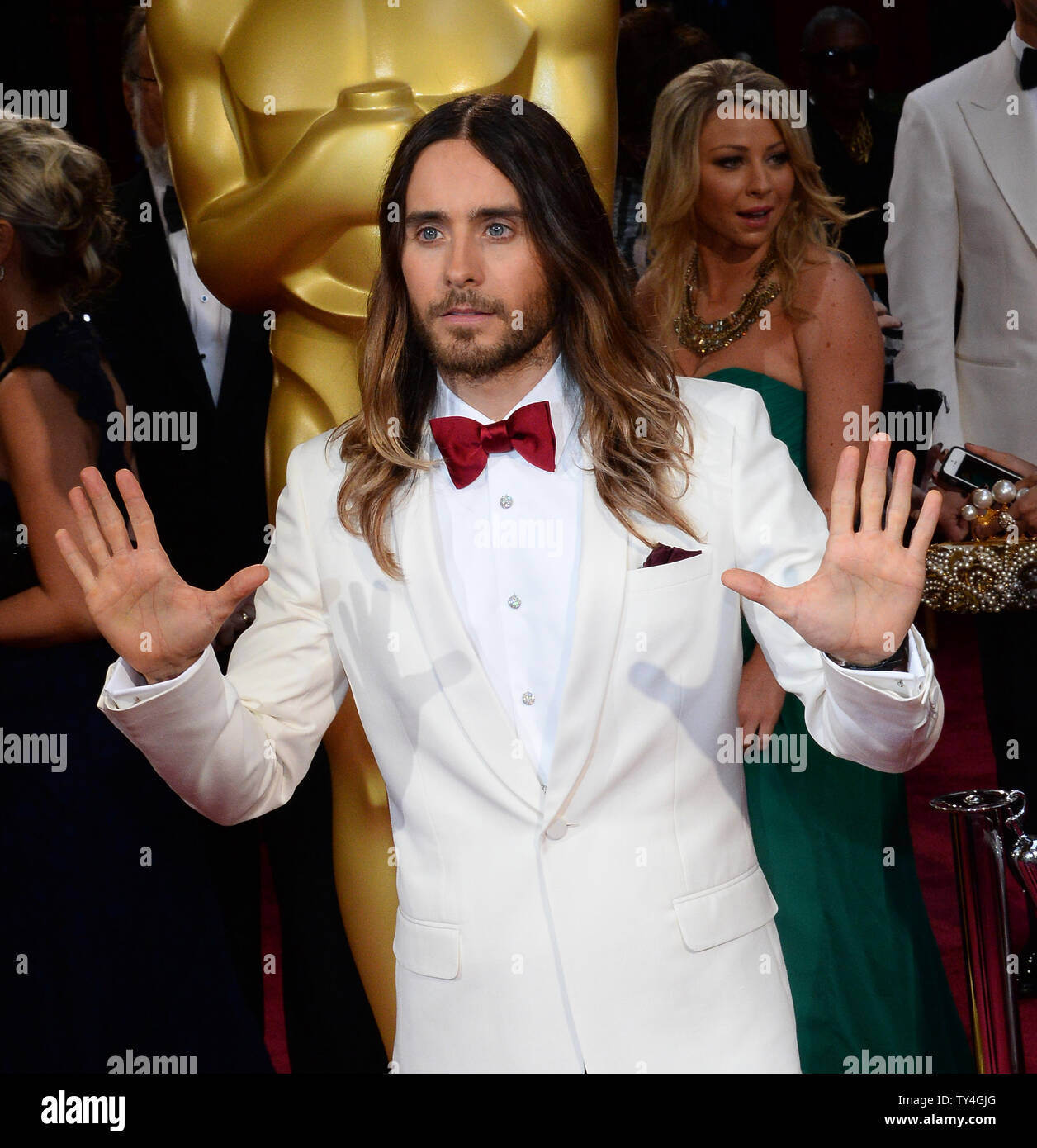 Actor Jared Leto arrives on the red carpet at the 86th Academy Awards ...