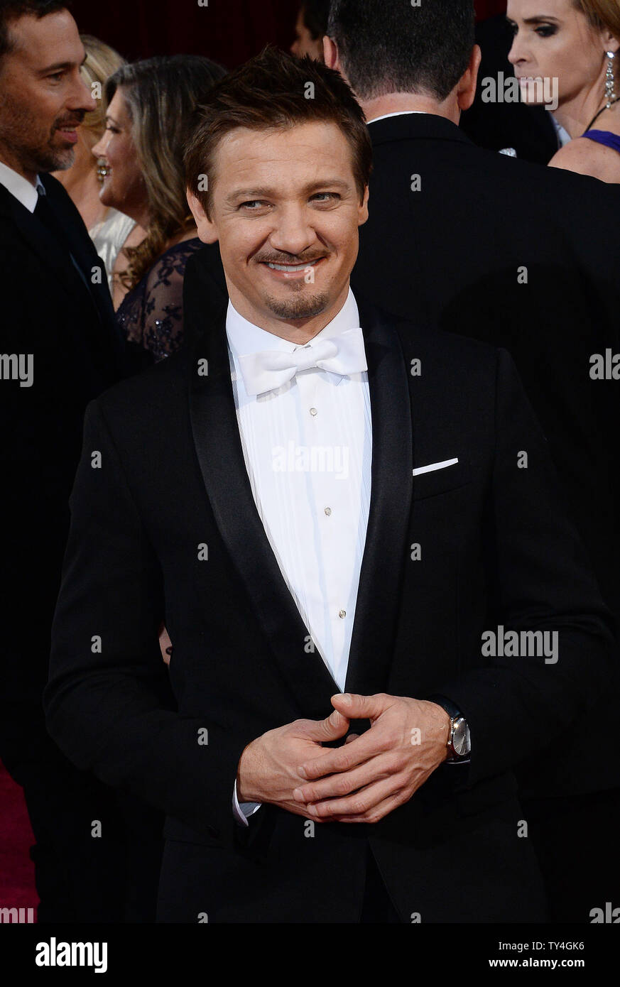 Actor Jeremy Renner arrives on the red carpet at the 86th Academy ...