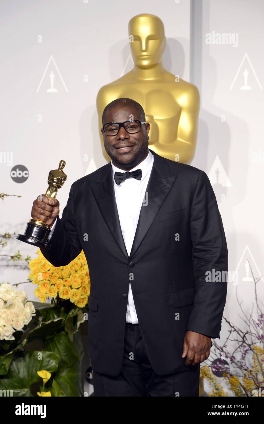 Director Steve Mcqueen Holds His Oscar After Winning Best Picture For