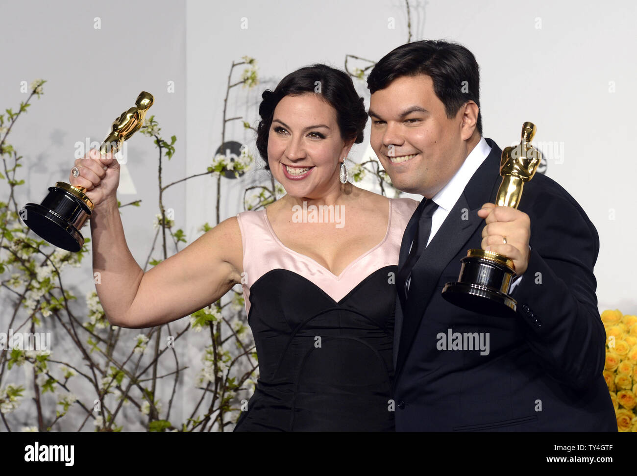 Songwriters Kristen Anderson-Lopez (L) and Robert Lopez hold their ...