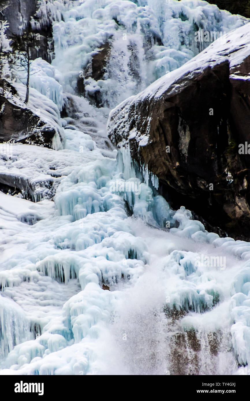 Beautiful, colorful frozen waterfall.Stunning winter scene. Awesome ...