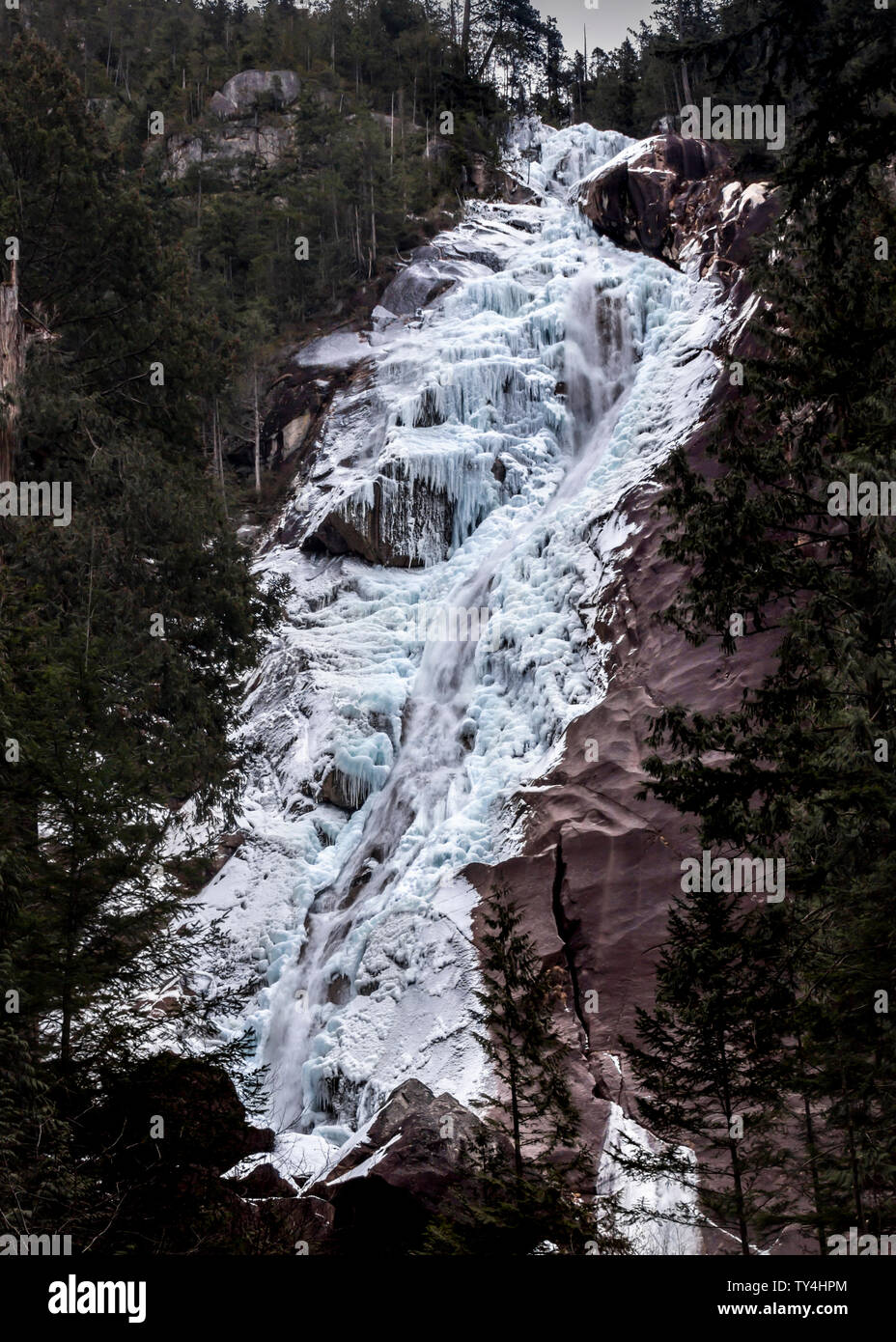 Beautiful, colorful frozen waterfall.Stunning winter scene. Awesome ...