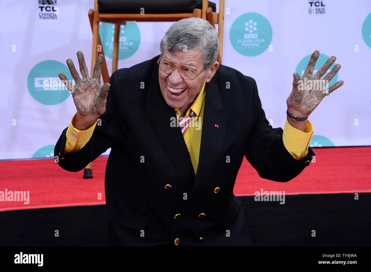 Actor Jerry Lewis participates in a hand & footprint ceremony, placing ...