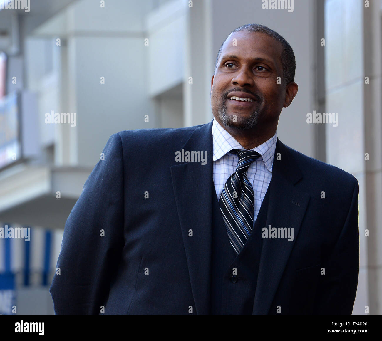 Television personality Tavis Smiley listens to comments during an ...