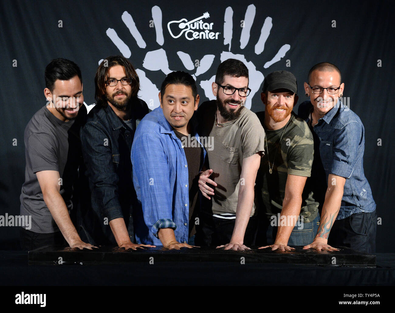Members of the American rock band Linkin Park, Mike Shinoda, Rob ...