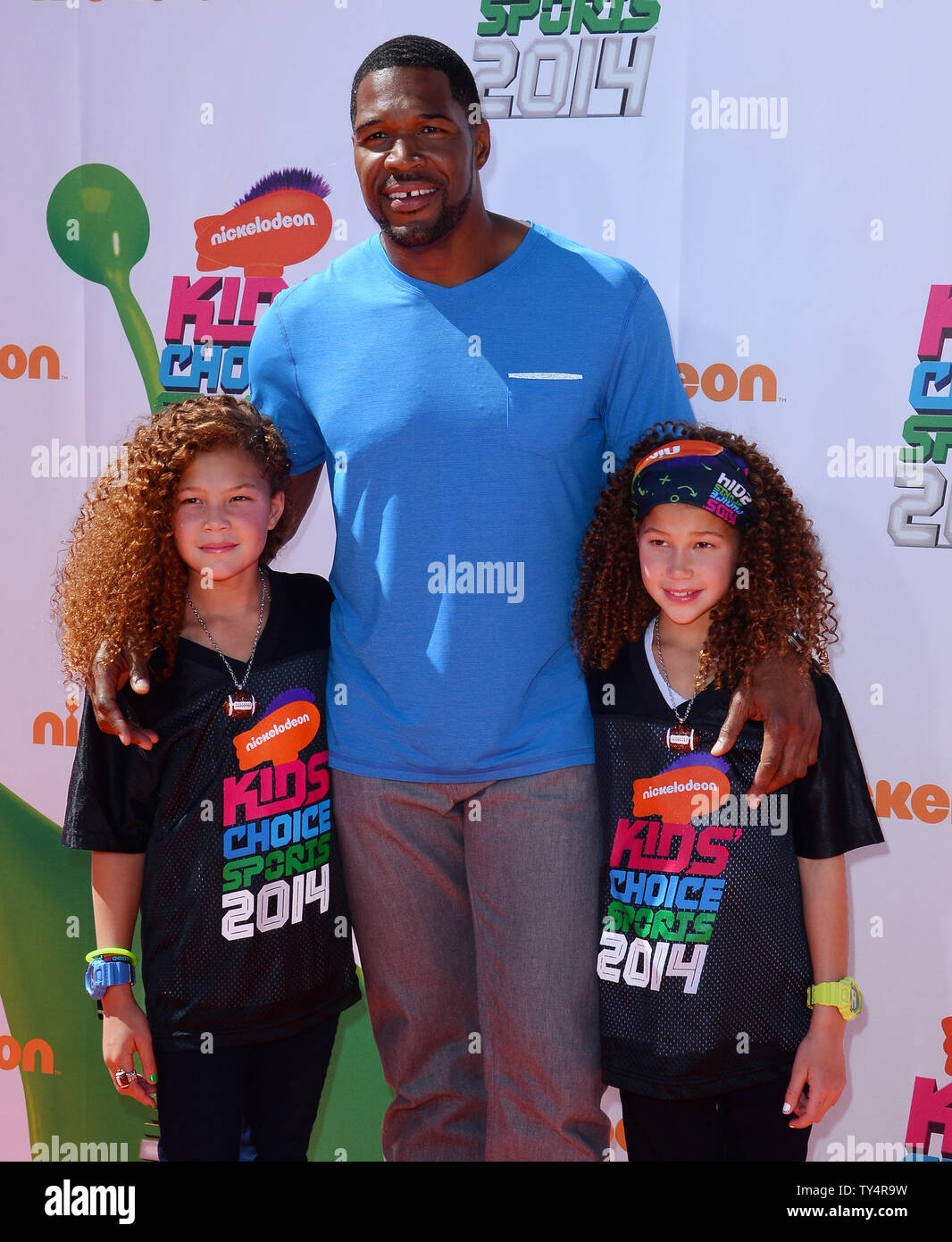 TV personality and show host Michael Strahan and his daughters Isabella ...