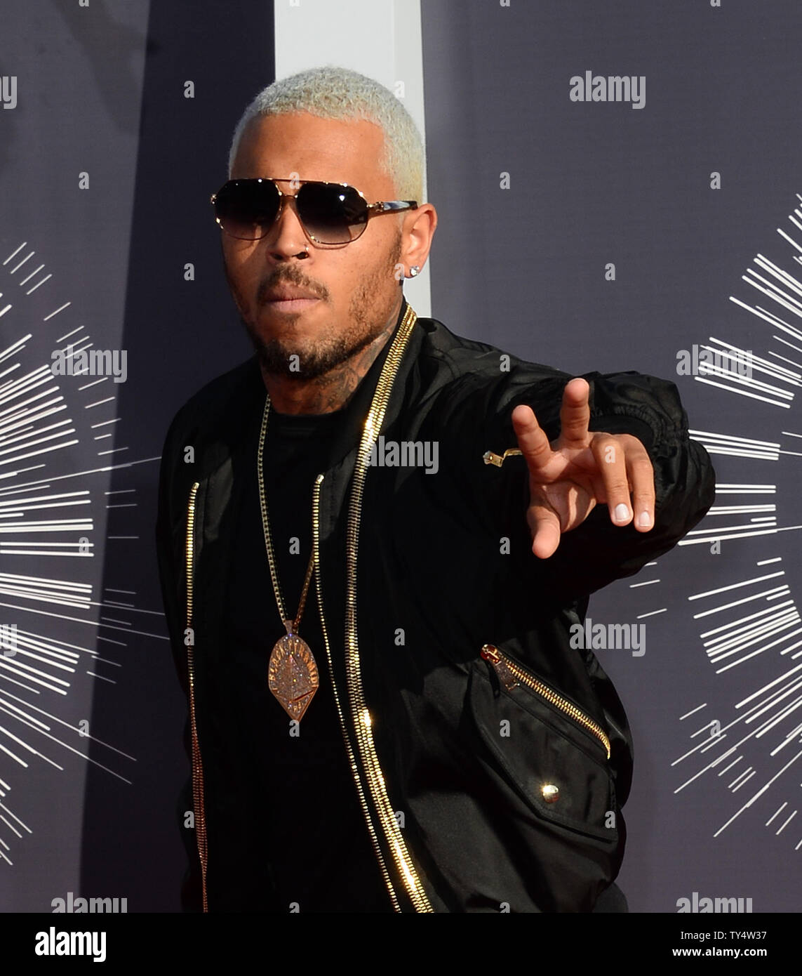 Chris Brown arrives at the 2014 MTV Video Music Awards at the Forum in ...