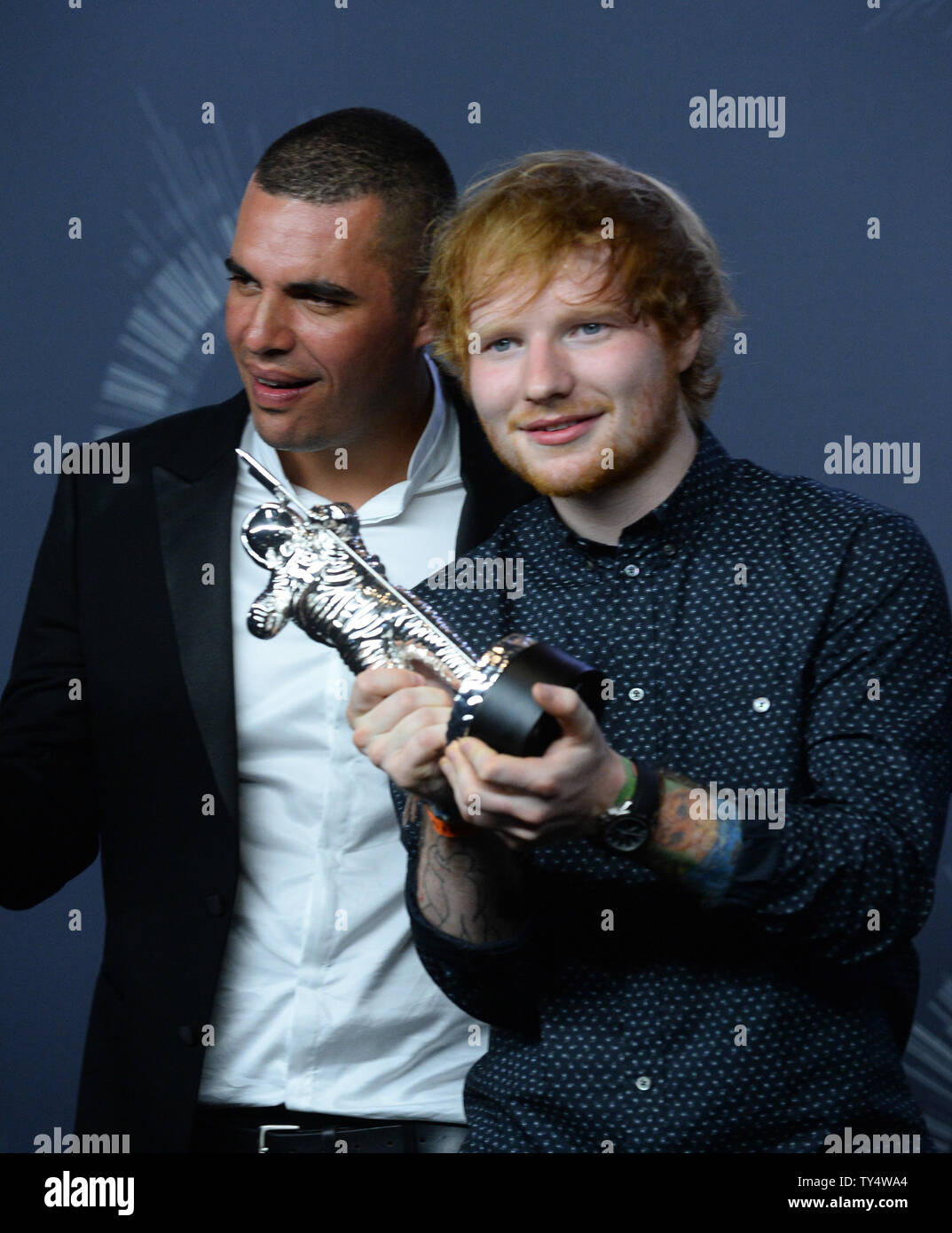 Emil Nava, left, and Ed Sheeran, winner of Best Male Video, pose ...