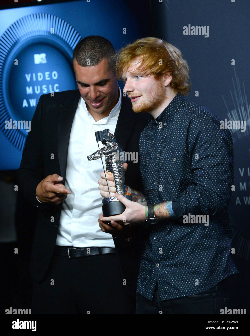 Emil Nava, left, and Ed Sheeran, winner of Best Male Video, pose ...