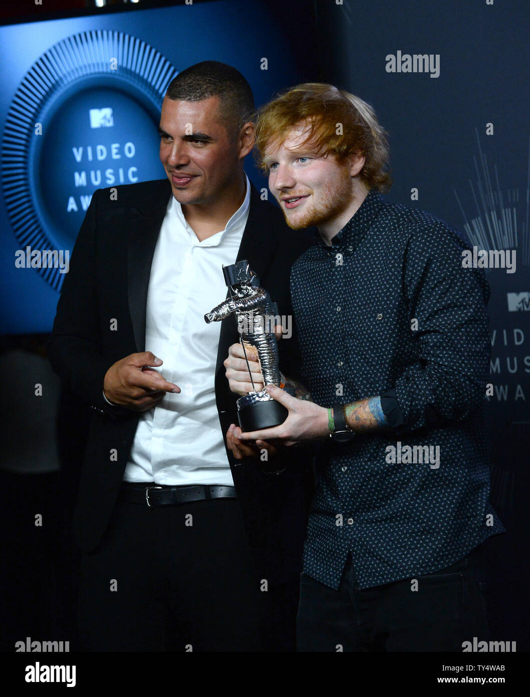Emil Nava, left, and Ed Sheeran, winner of Best Male Video, pose ...