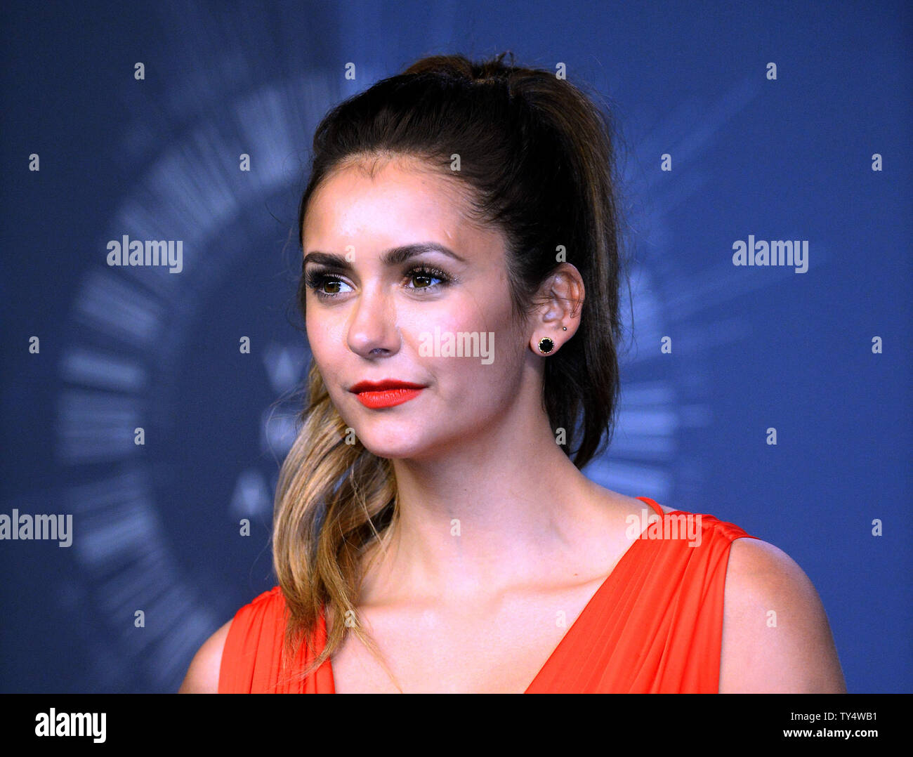 Nina Dobrev poses backstage during the 2014 MTV Video Music Awards at ...