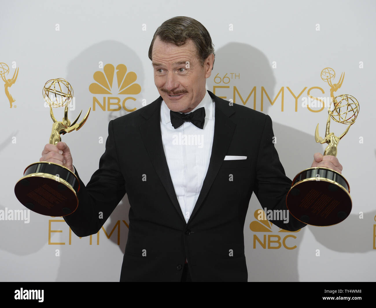 Bryan Cranston hold his Emmys at the Primetime Emmy Awards at the Nokia ...