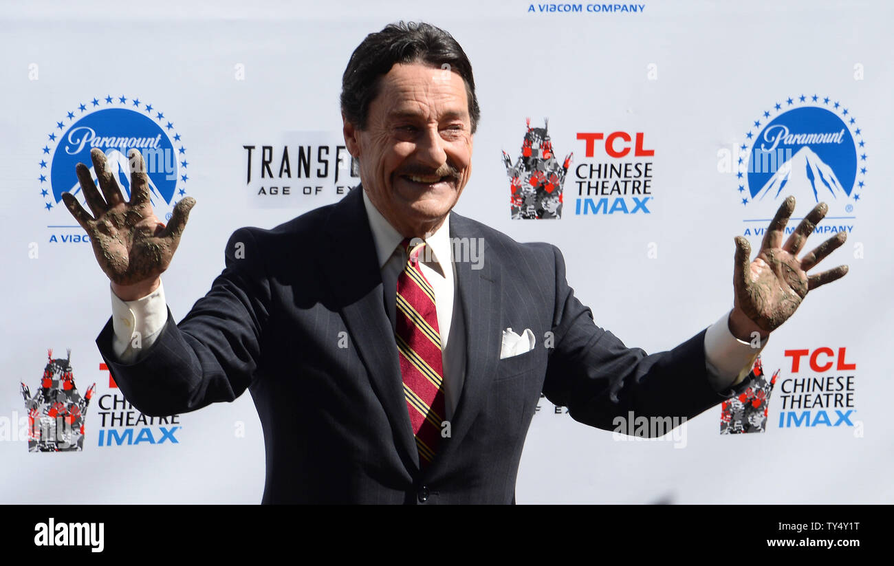 Canadian voice actor Peter Cullen raises his hands during a handprint ...