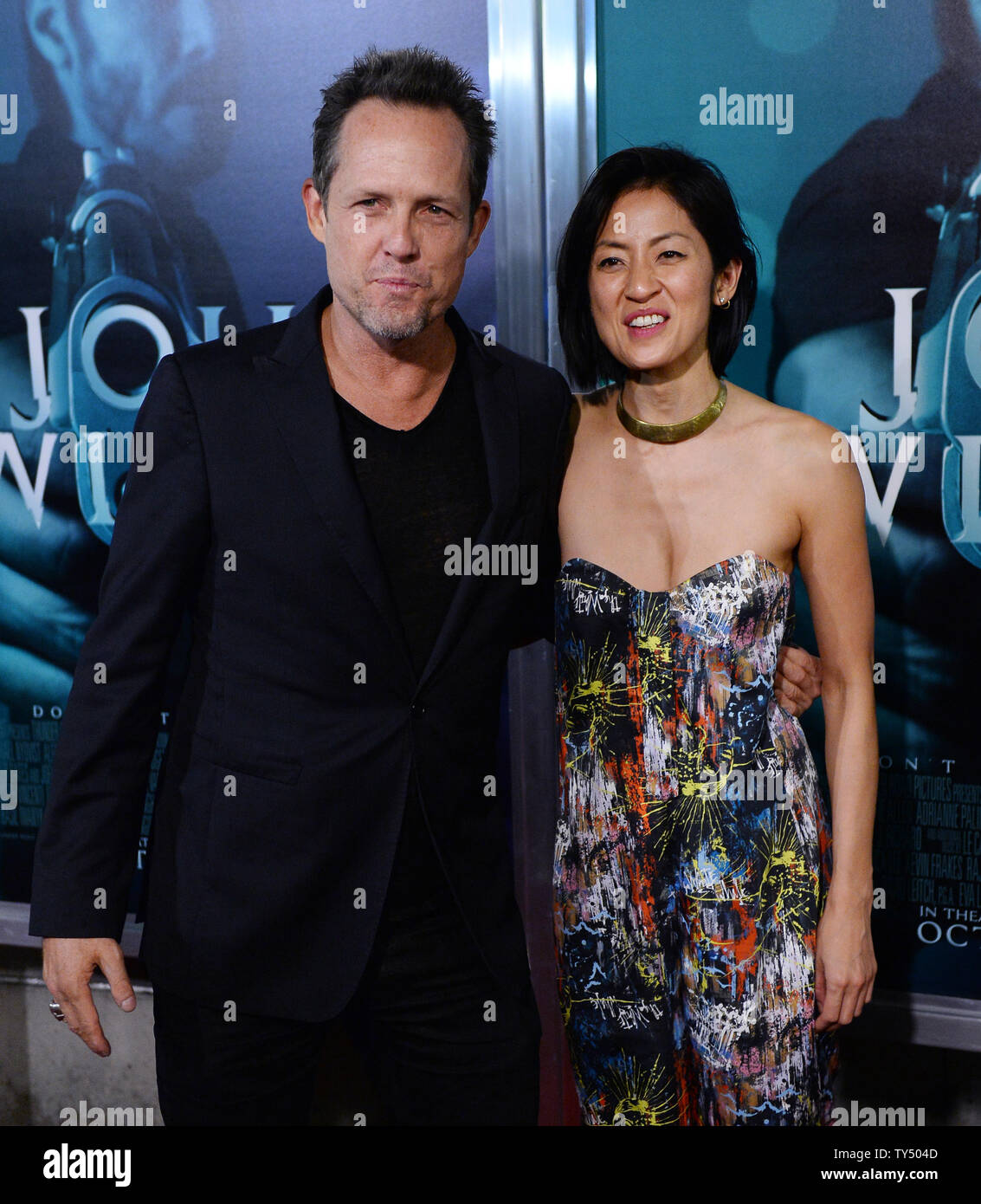 Cast member Dean Winters and a guest attend the premiere of the motion ...