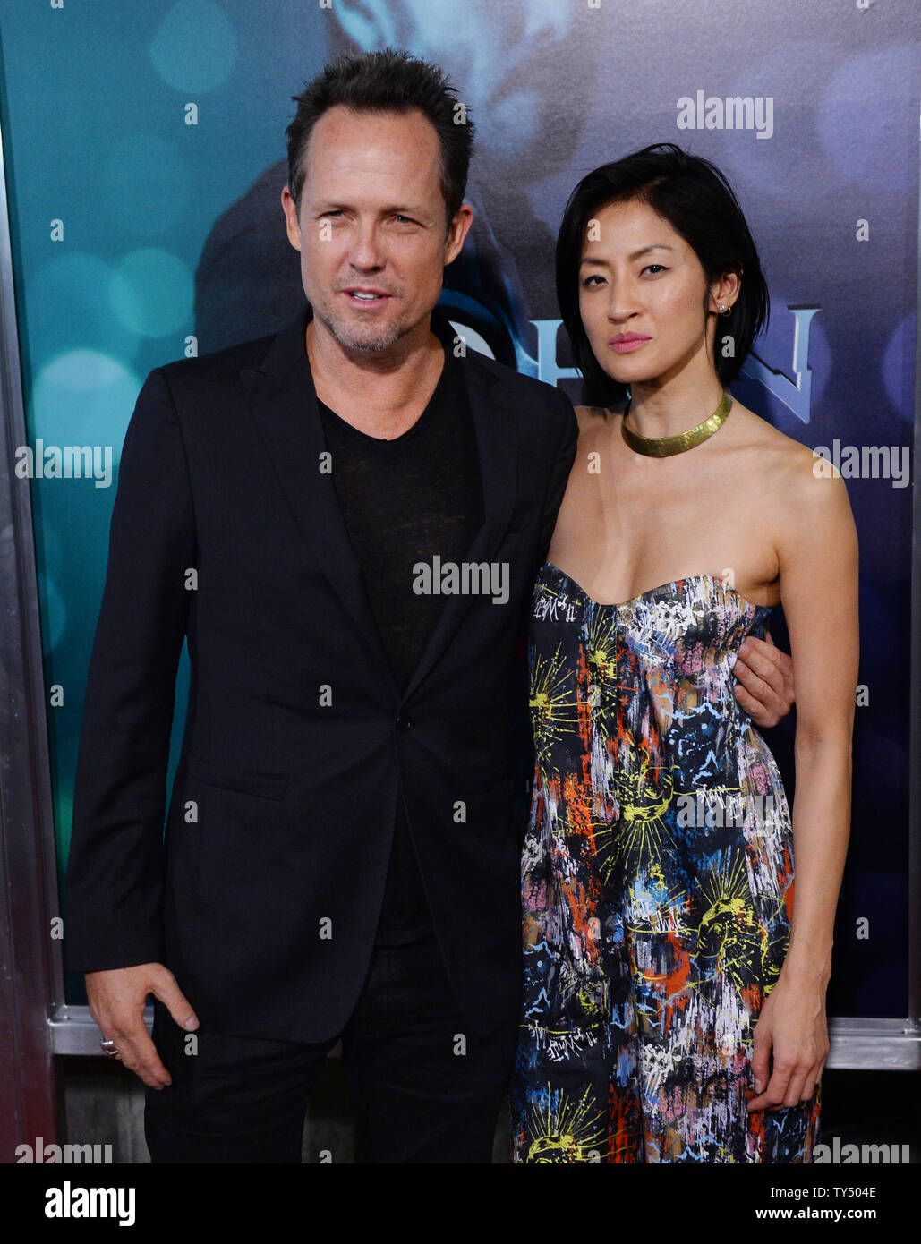 Cast member Dean Winters and a guest attend the premiere of the motion ...