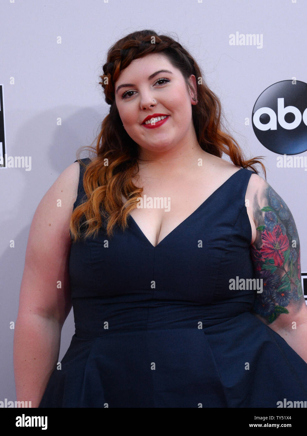 Singer Mary Lambert arrives for the 42nd annual American Music Awards ...