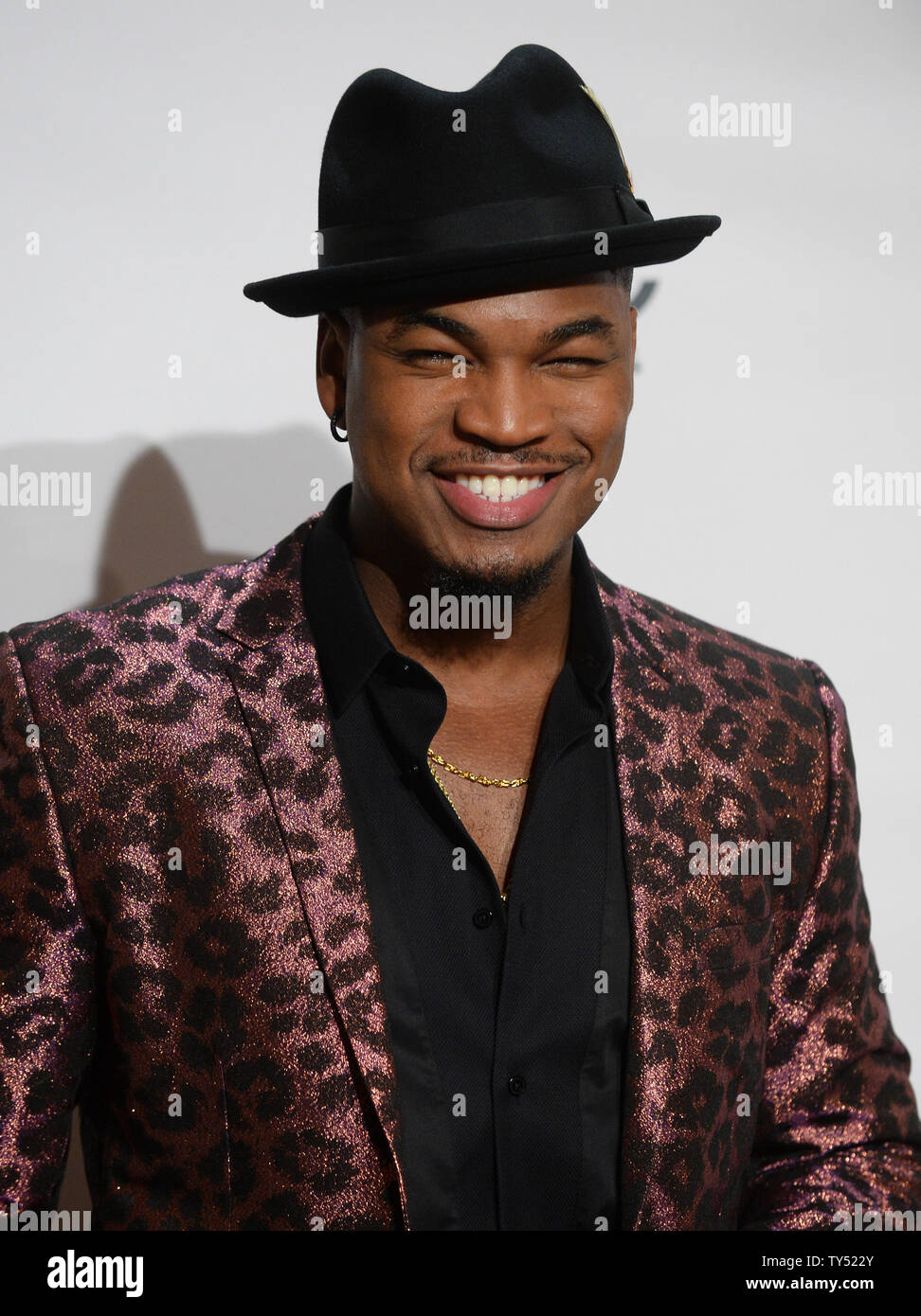 Singer Ne-Yo poses backstage at the 42nd annual American Music Awards ...