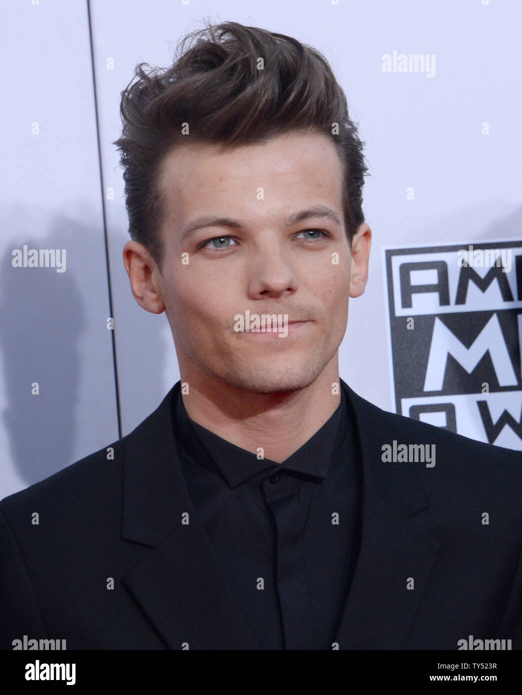 Singer Louis Tomlinson, of One Direction, arrives for the 42nd annual ...
