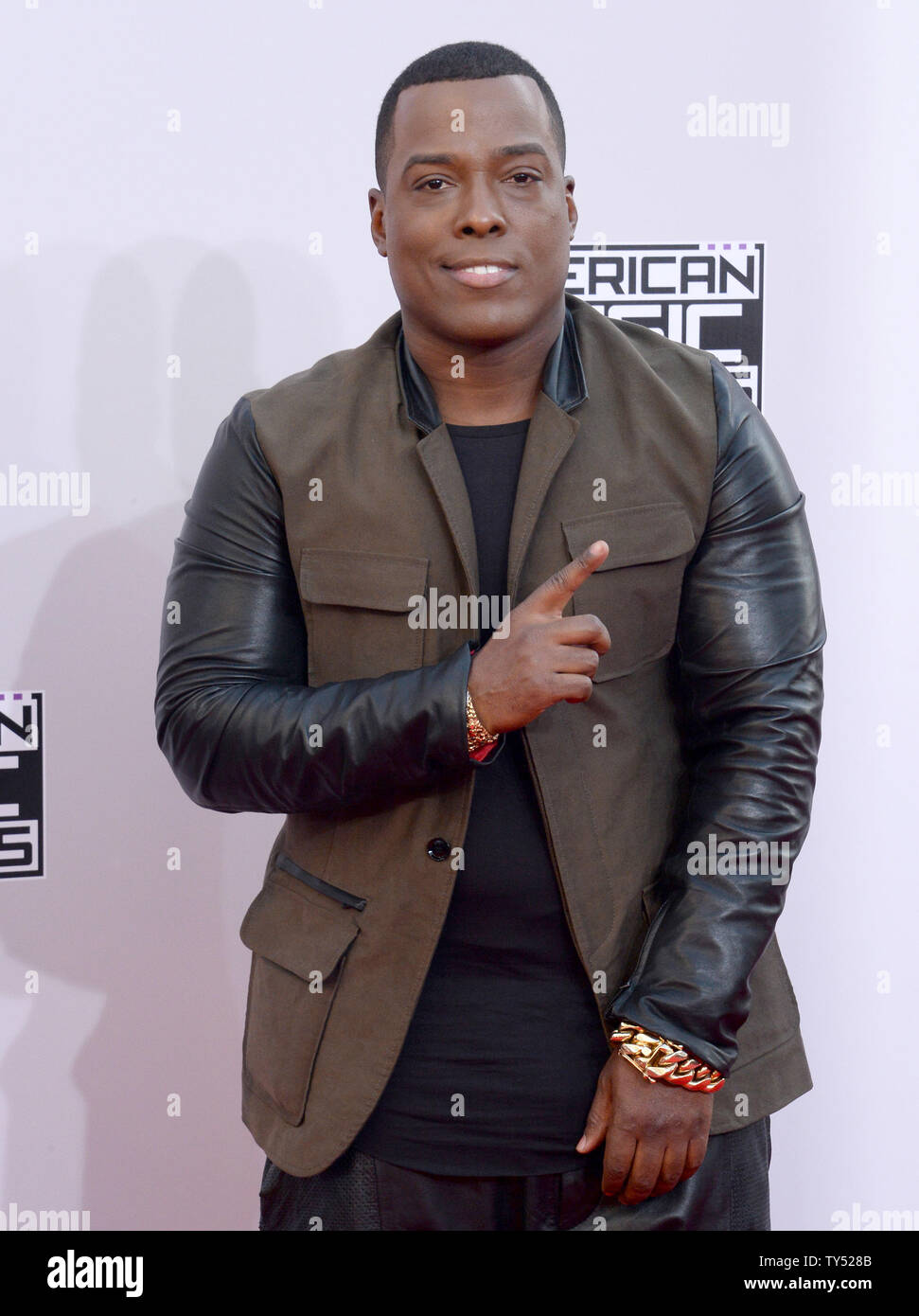 Singer Won-G Bruny arrives for the 42nd annual American Music Awards ...