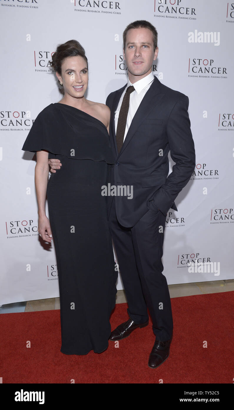 Armie Hammer and wife Elizabeth Chambers attend the Stop Cancer annual ...