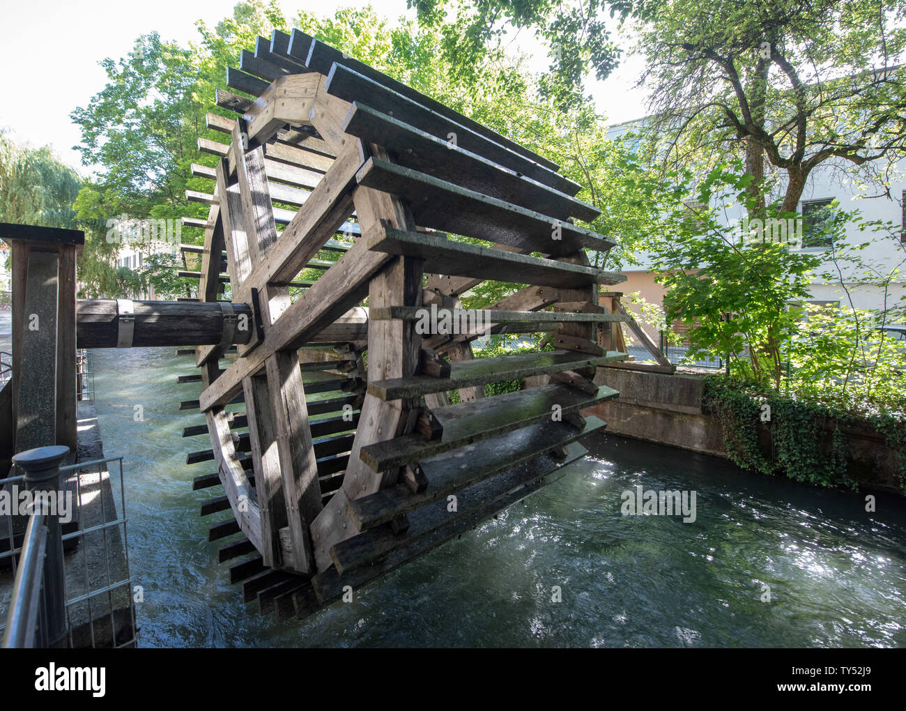Augsburg, Germany. 24th June, 2019. A water wheel turns at the ...