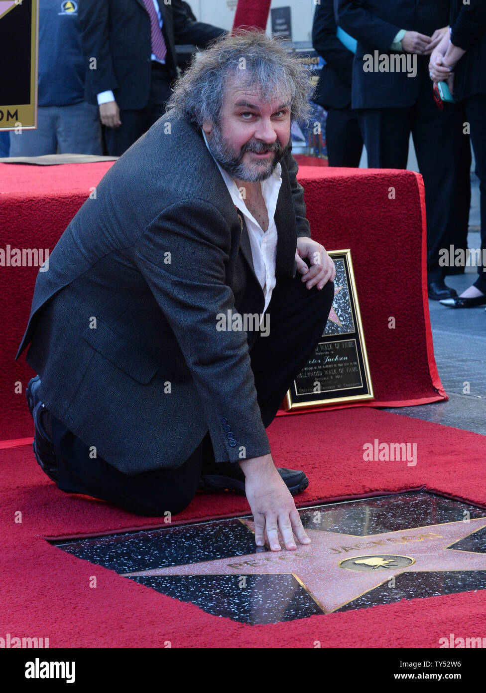 Director Peter Jackson touches his star during an unveiling ceremony ...