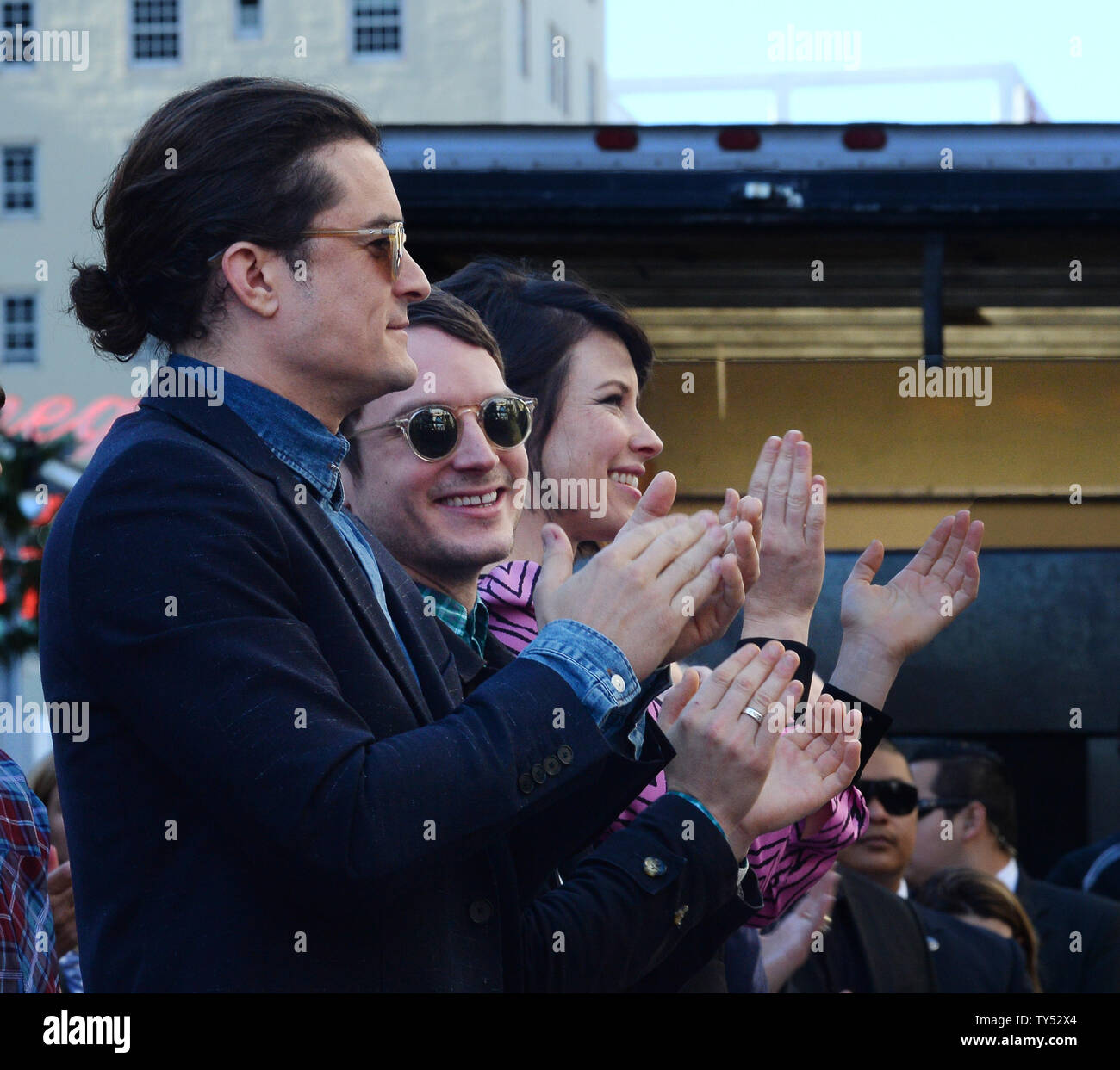 Actors Orlando Bloom, Elijah Wood and Evangeline Lilly attend an ...