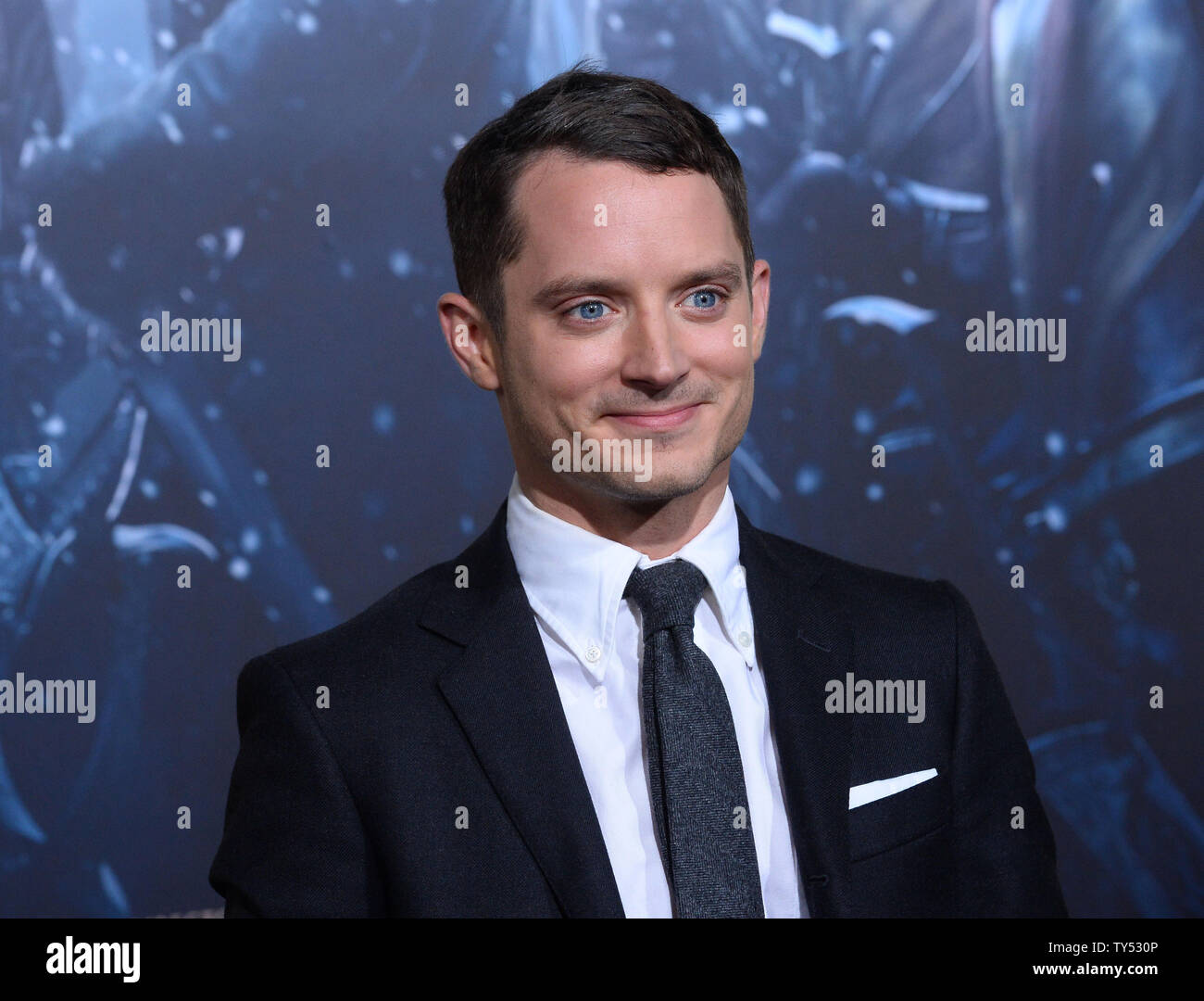 Actor Elijah Wood attends the premiere of the motion picture fantasy ...