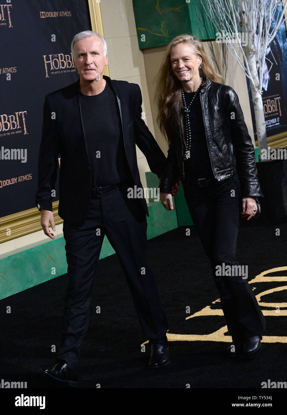 Director James Cameron, left, and Suzy Amis attend the premiere of the ...