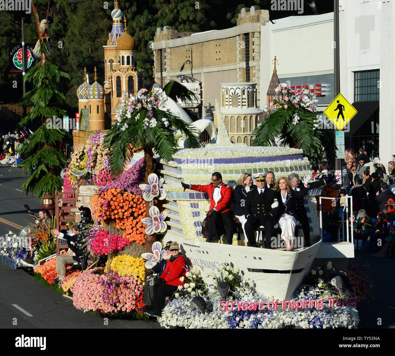 The cast of the television show ' The Love Boat' waves to the crowd on ...