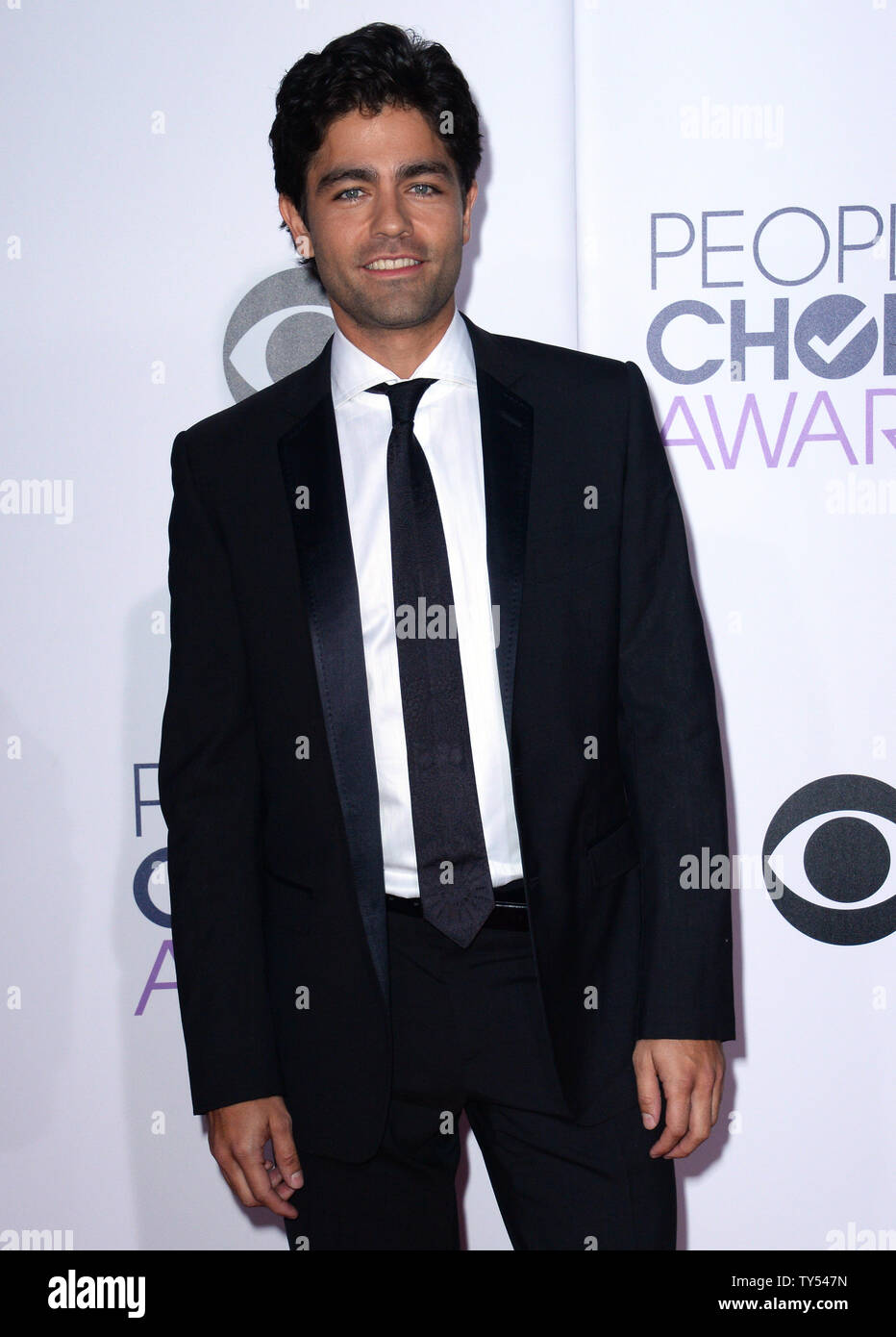 Actor Adrian Grenier arrive for the 41st annual People's Choice Awards ...