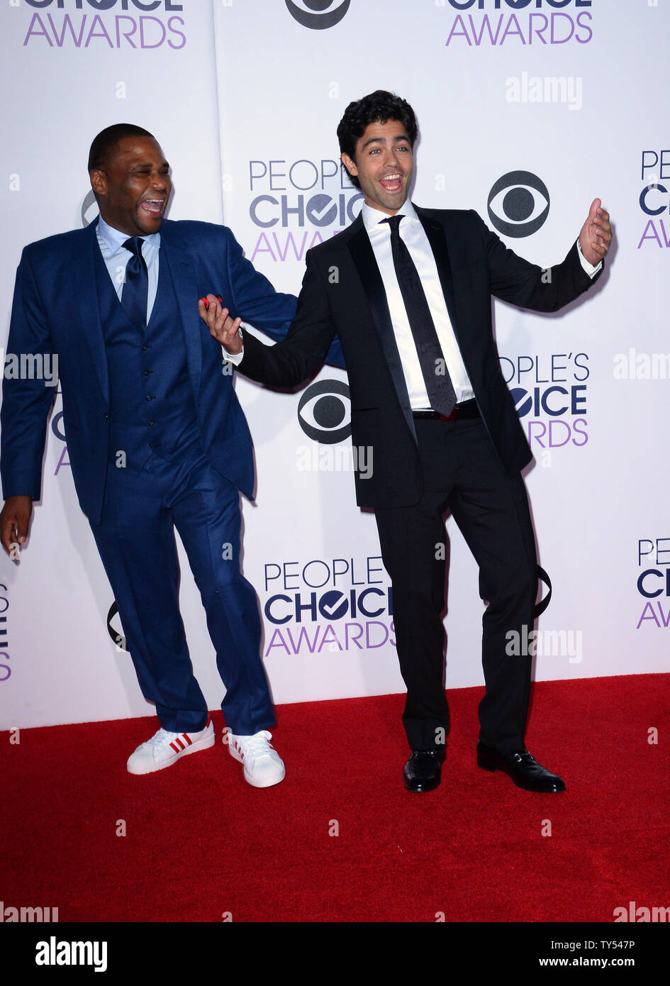 Actor Anthony Anderson, left, and actor Adrian Grenier arrive for the ...