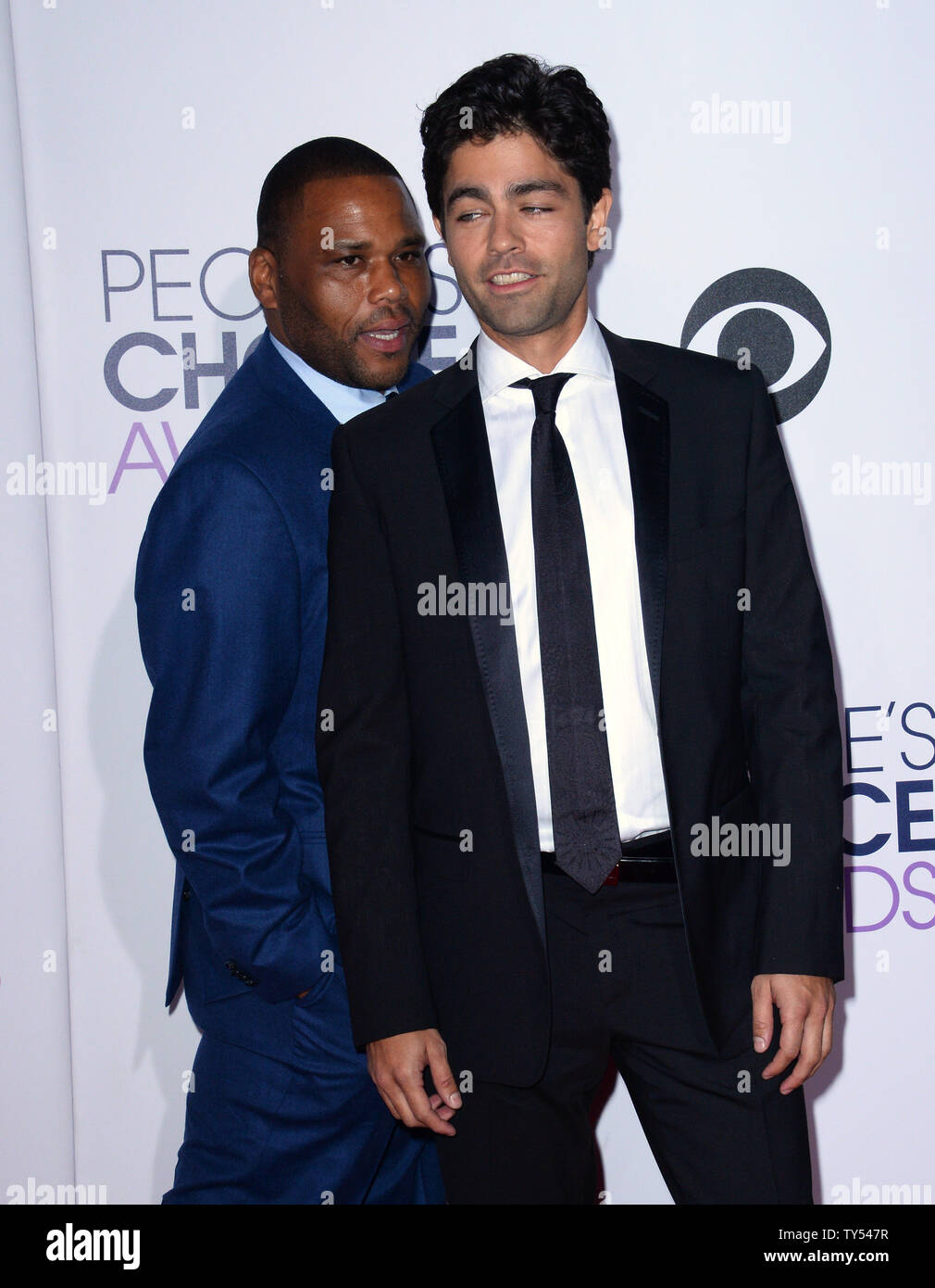 Actor Anthony Anderson, left, and actor Adrian Grenier arrive for the ...