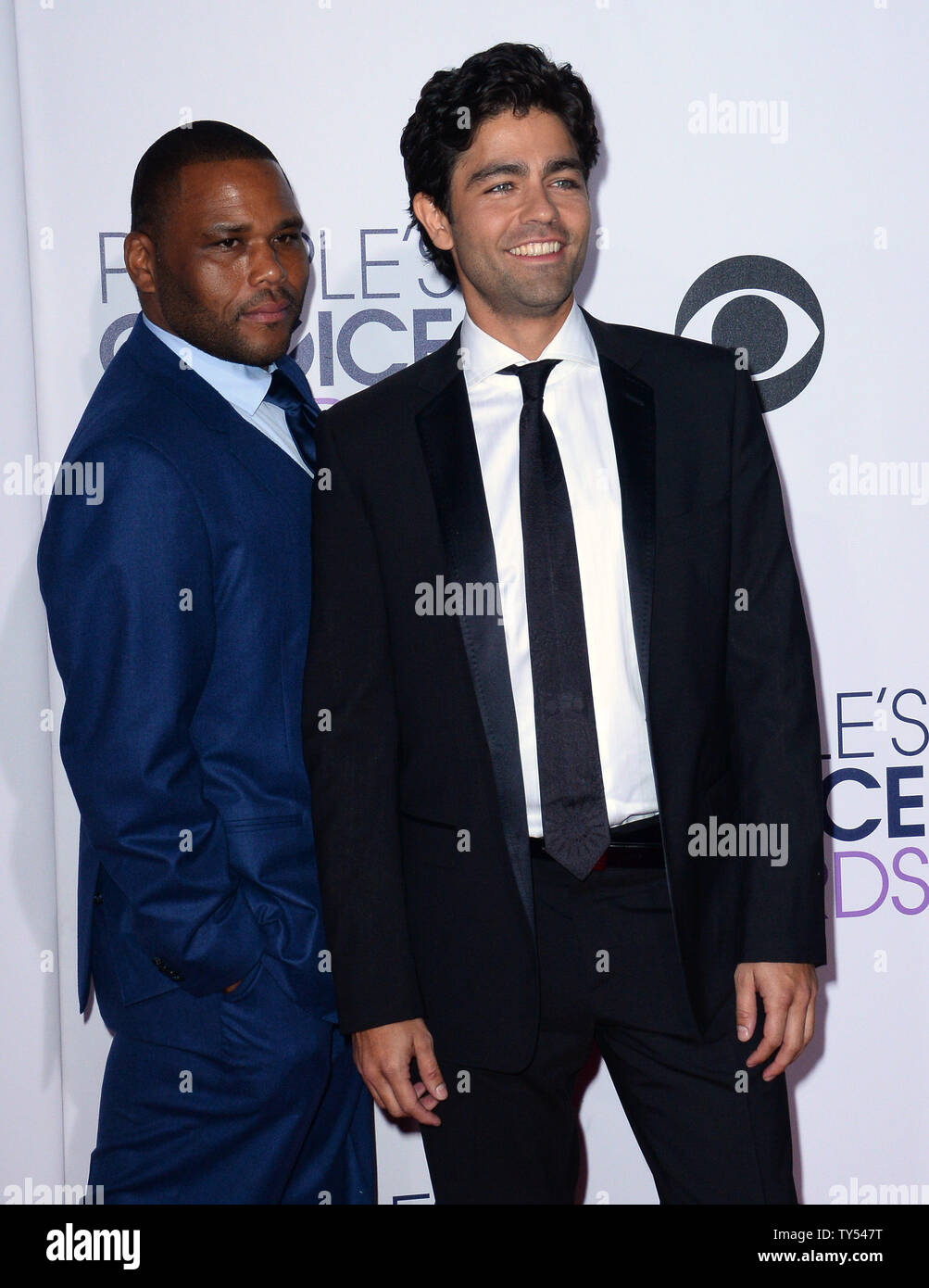 Actor Anthony Anderson, left, and actor Adrian Grenier arrive for the ...