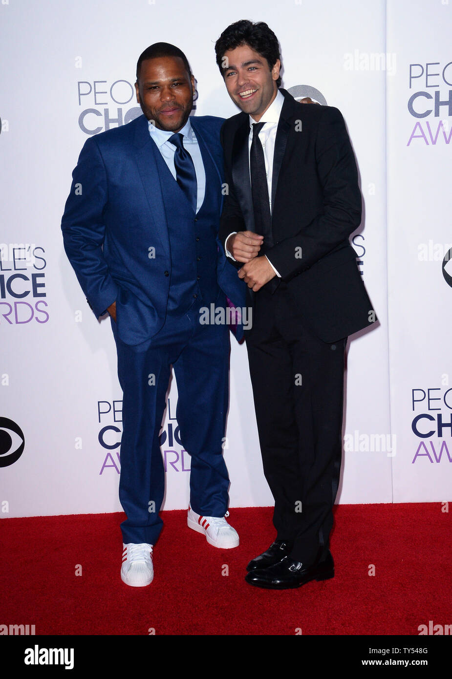 Actor Anthony Anderson, left, and actor Adrian Grenier arrive for the ...