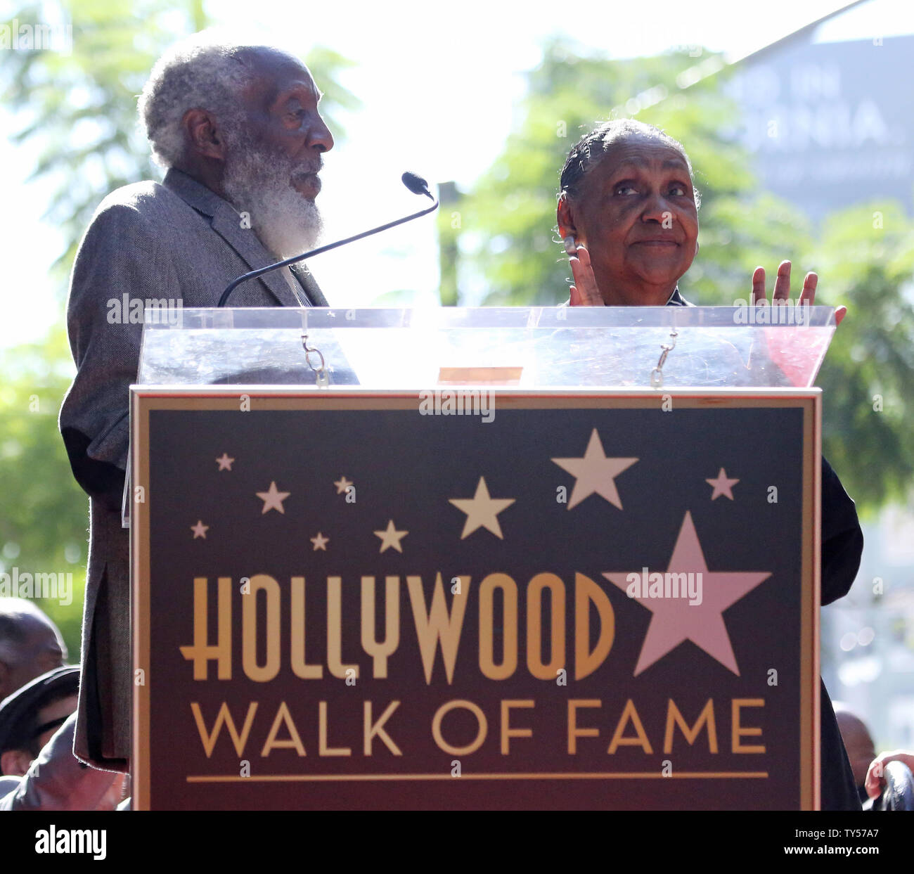 Dick Gregory (C) and his wife Lillian address attendees during the ...