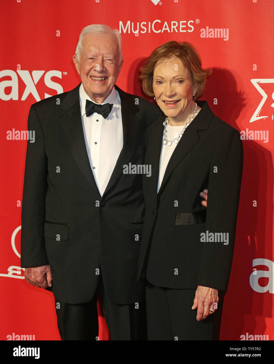 Former U.S. President Jimmy Carter and his wife Rosalynn Carter attend ...
