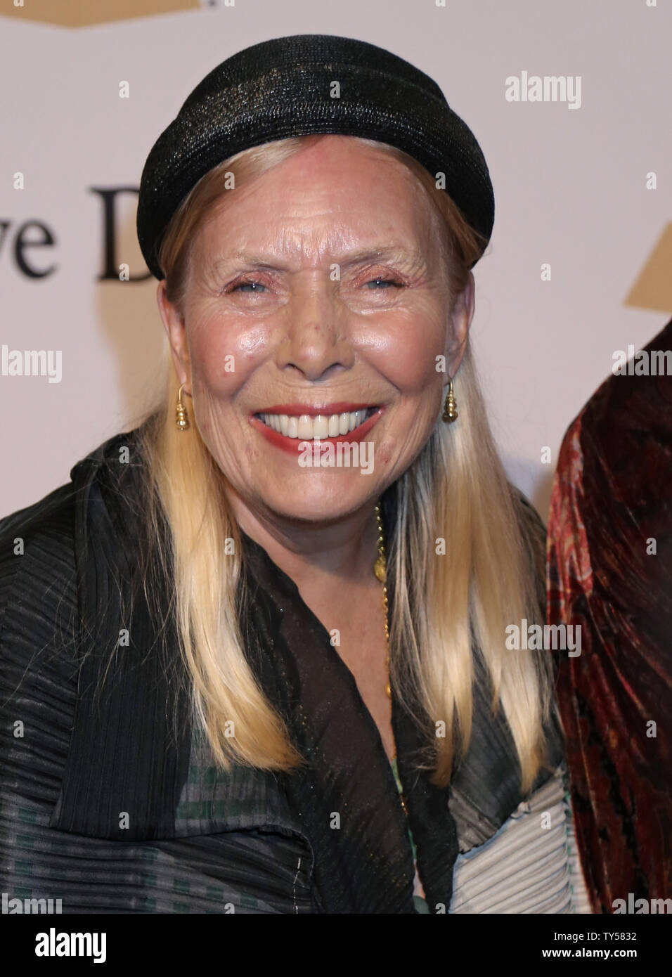 Joni Mitchell arrives on the red carpet before the annual Clive Davis ...