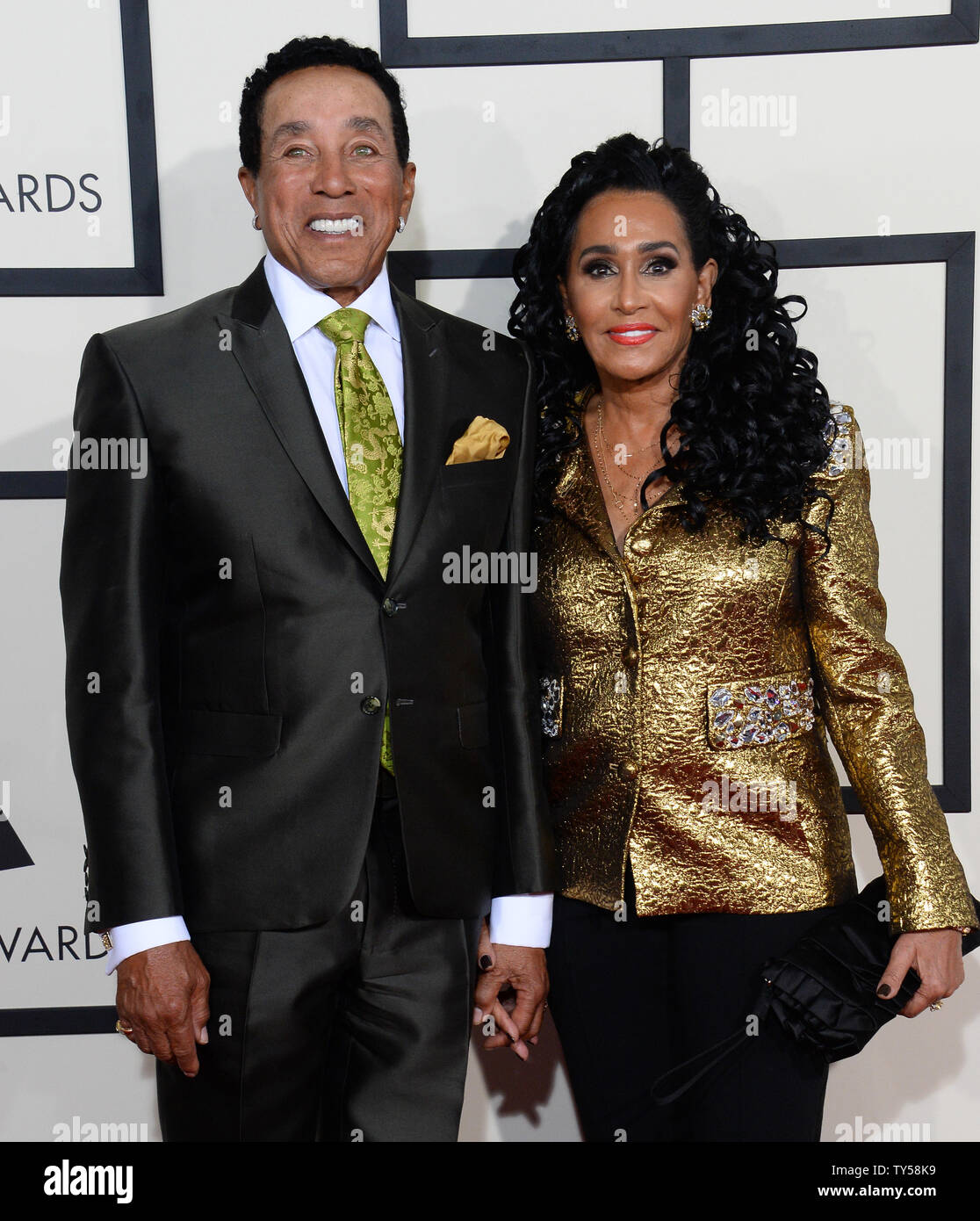 Smokey Robinson (L) and Frances Robinson arrive for the 57th Grammy ...
