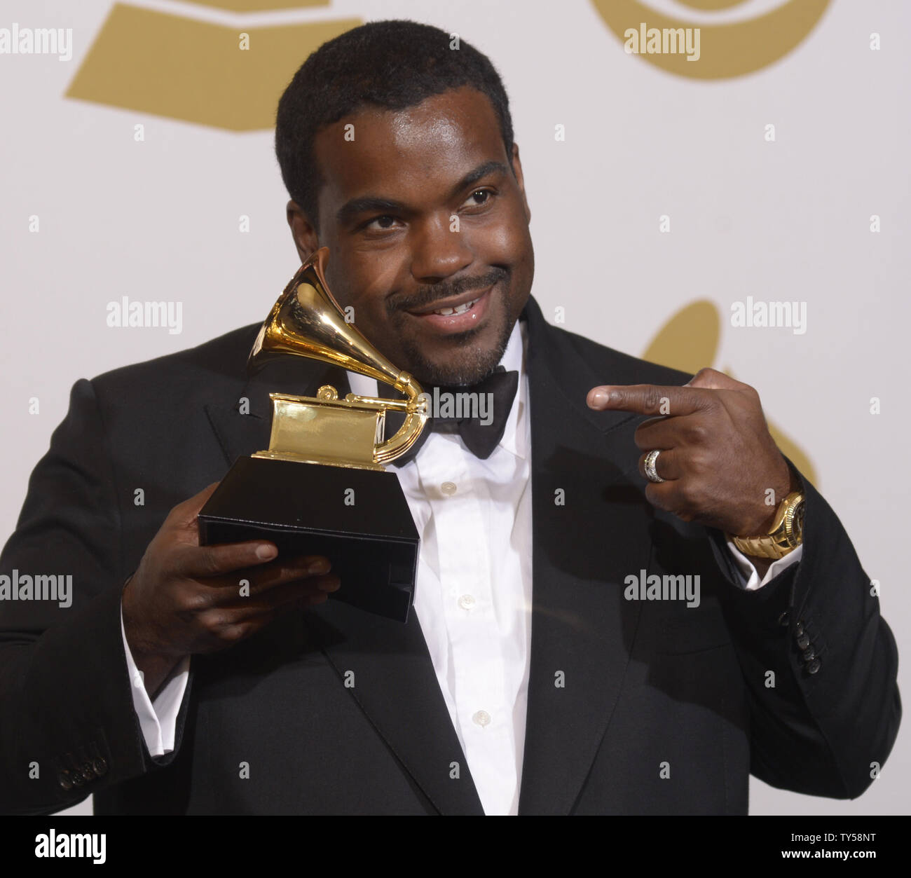 Producer Rodney Jerkins holds the Grammy he won Record of the Year ...