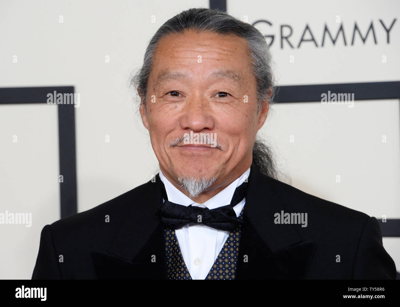 Japanese recording artist Kitaro arrives for the 57th Grammy Awards at ...