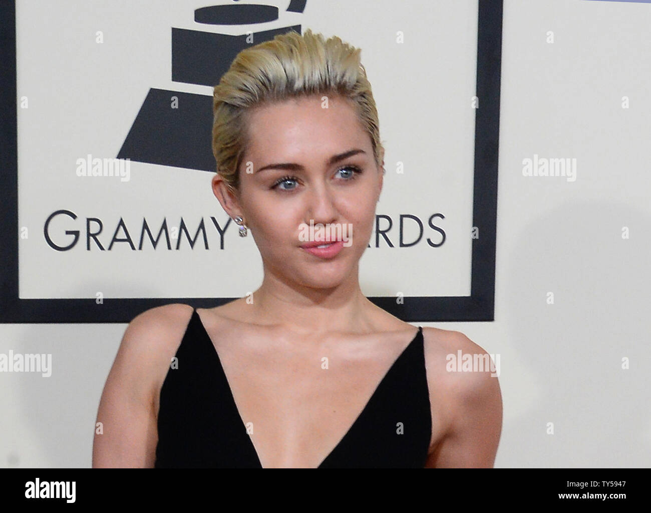 Recording artist Miley Cyrus arrives for the 57th Grammy Awards at ...