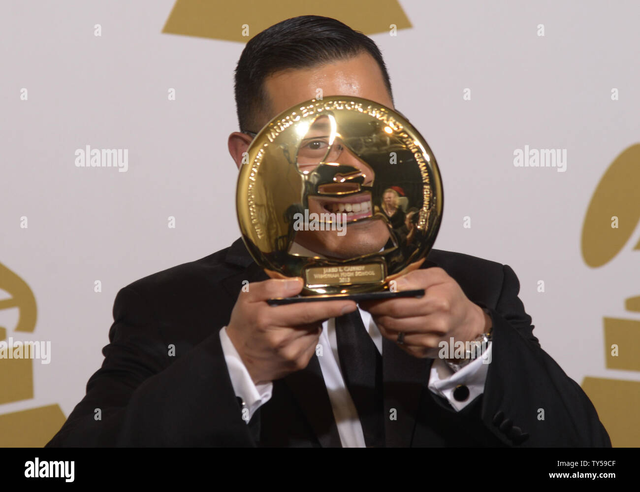 Music Educator Award Honoree Jared Cassedy poses backstage during the ...