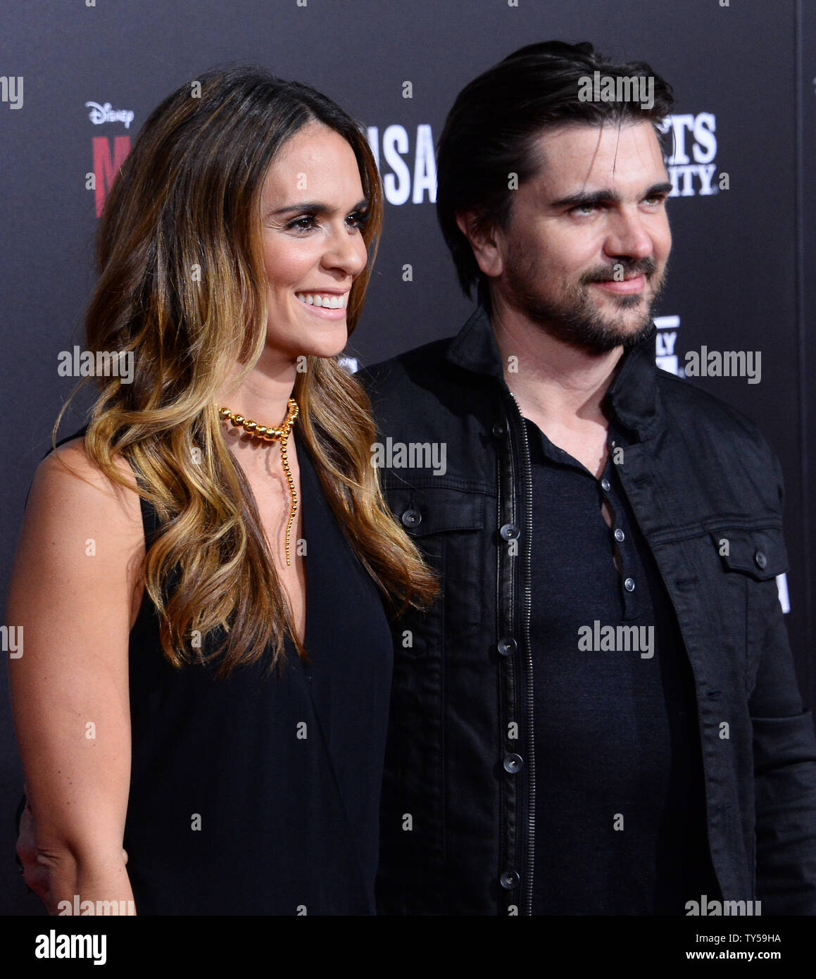 Columbian singer Juanes and his wife Karen Martinez attend the premiere ...