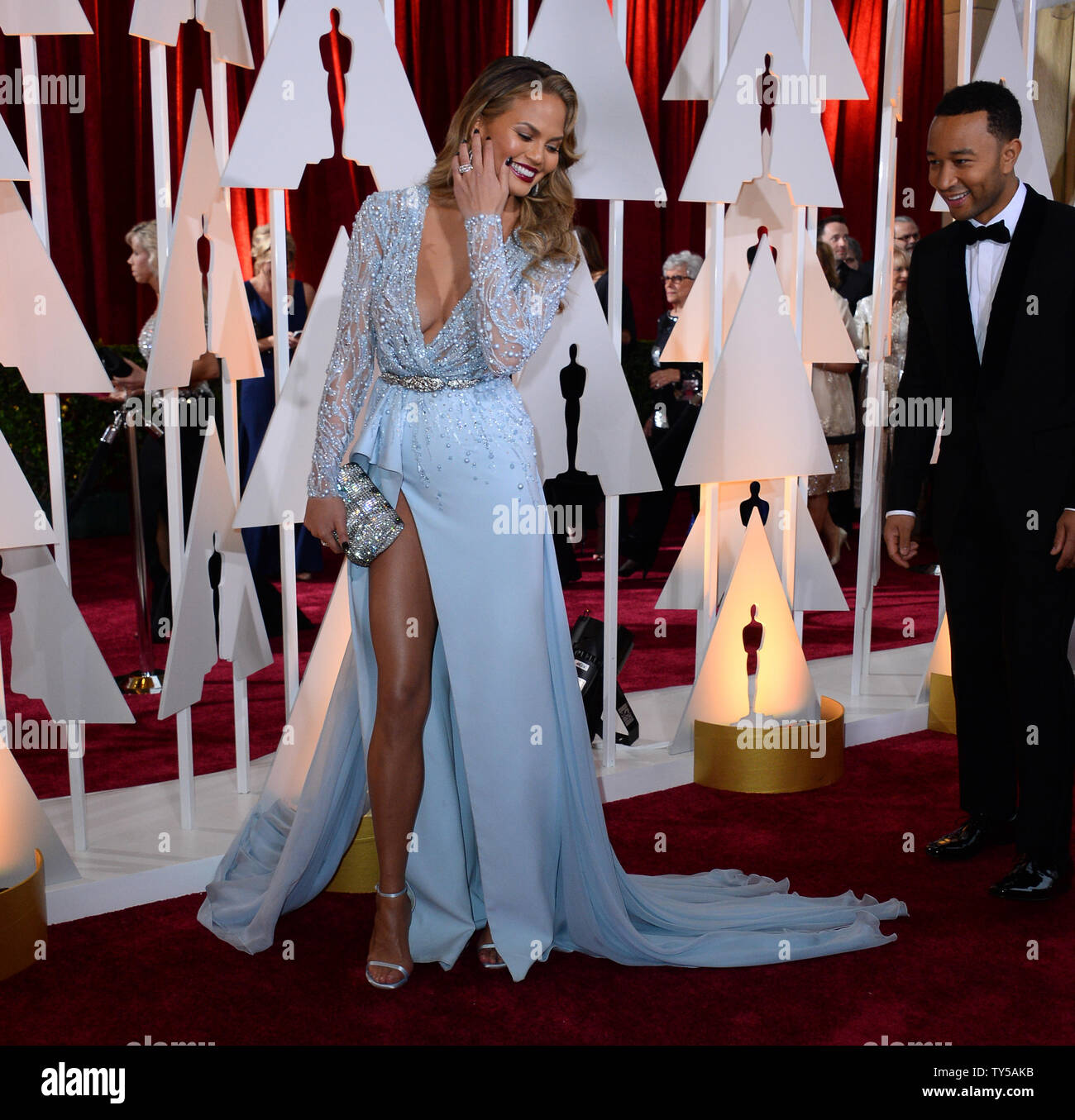 Model Chrissy Teigen (L) and musician John Legend arrive at the 87th ...