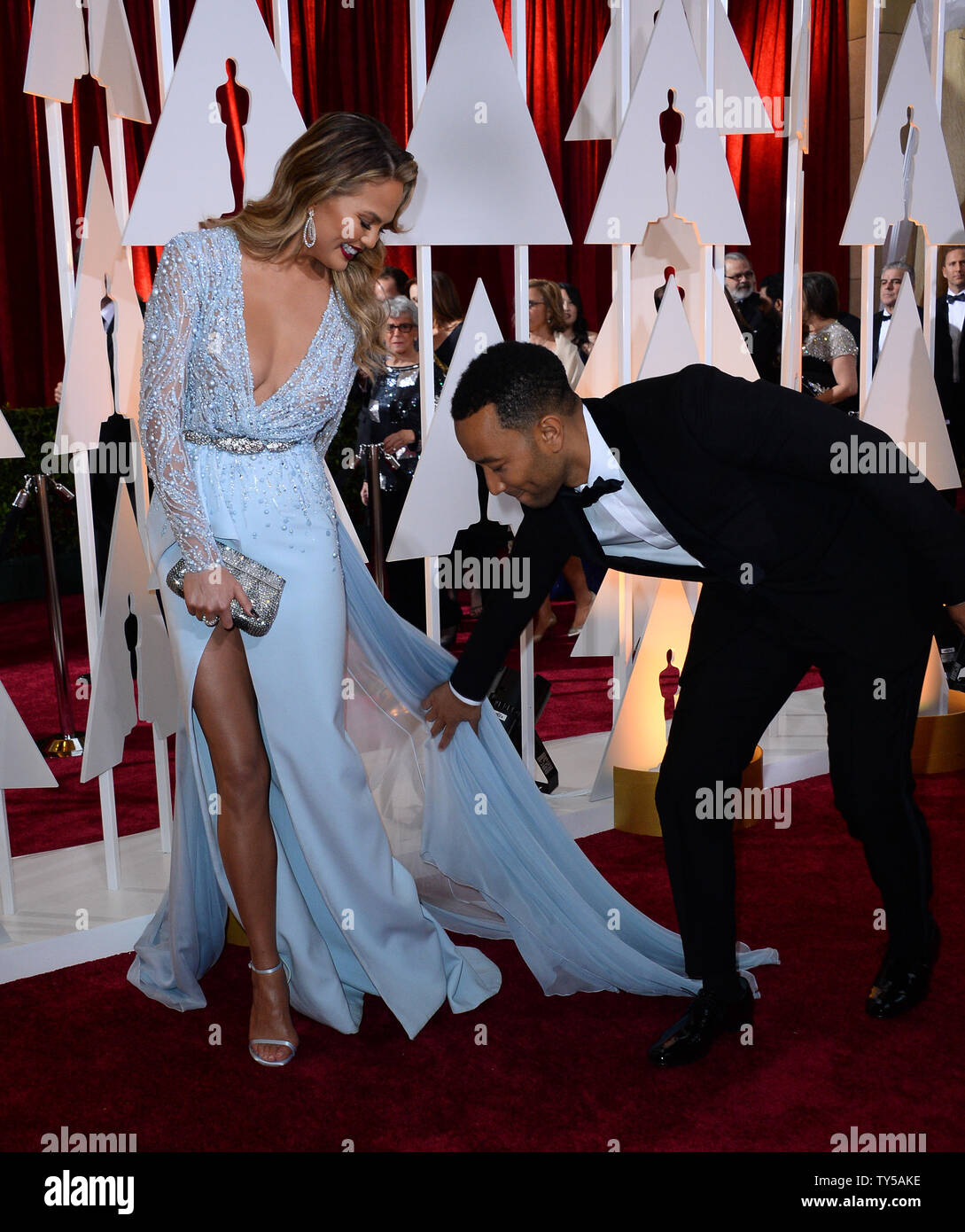 Model Chrissy Teigen (L) and musician John Legend arrive at the 87th ...