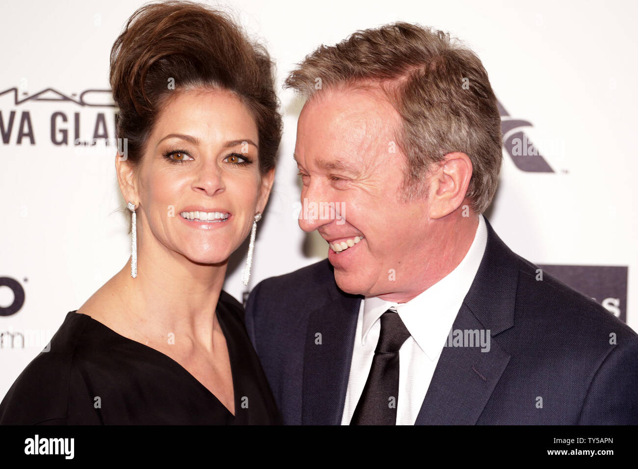 Jane Hajduk and Tim Allen arrives for the Elton John AIDS Foundation ...
