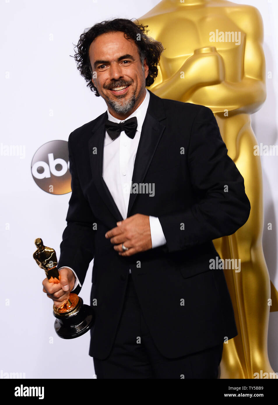 Alejandro Gonzalez Inarritu, winner of Best Director for Birman, poses ...