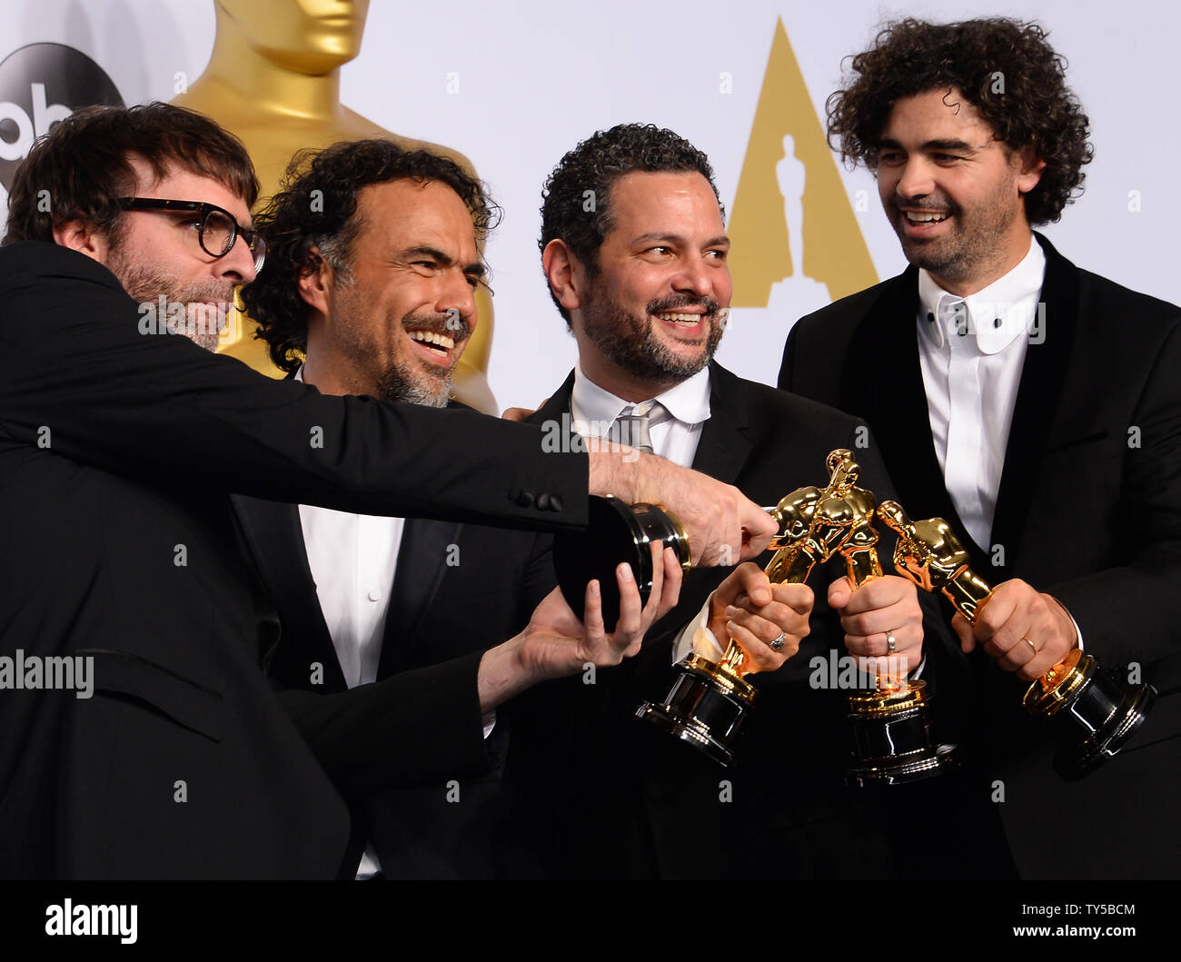 Alejandro Gonzalez Inarritu,(second from left), winner of Best Director ...