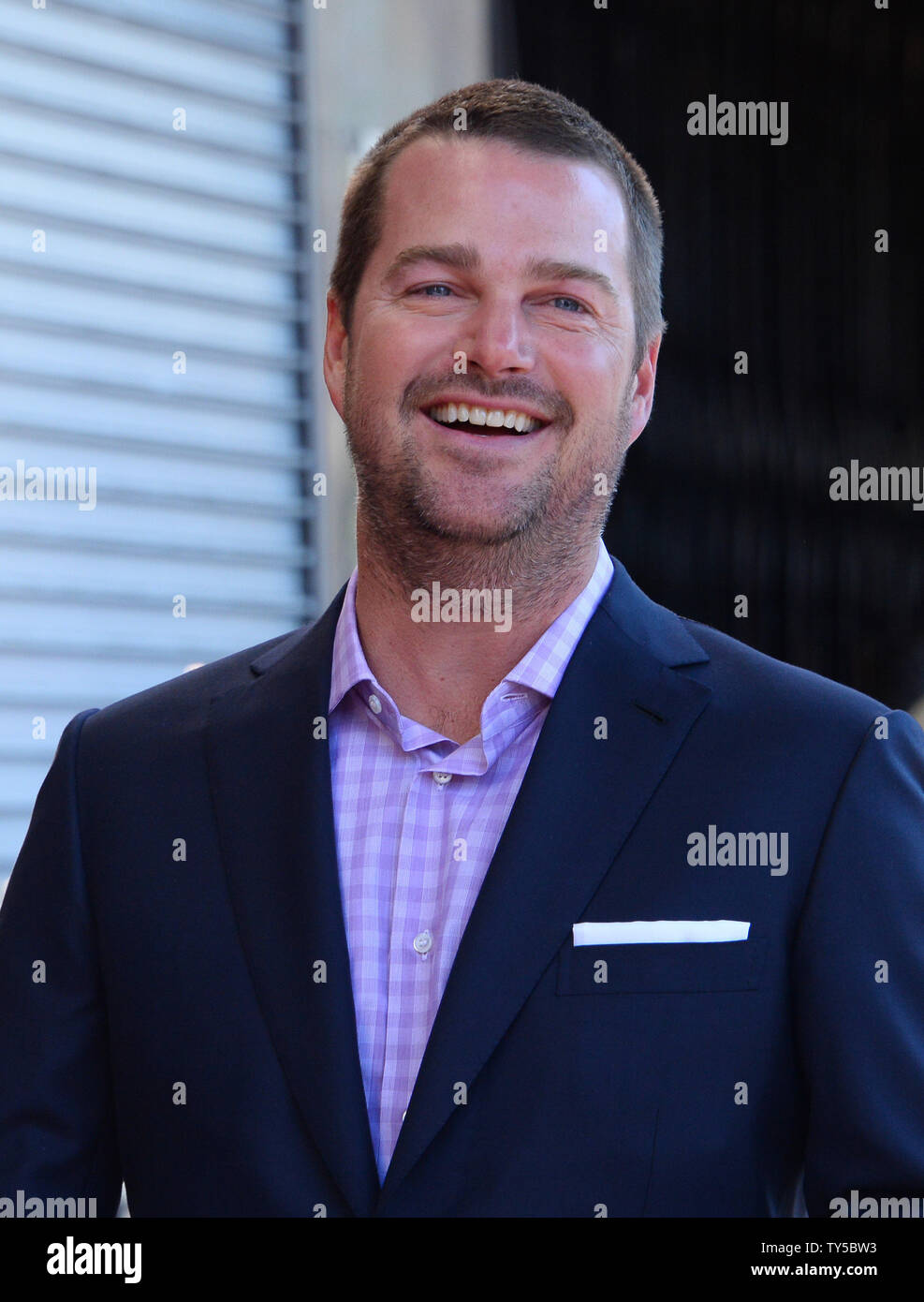 Actor Chris O'Donnell reacts to comments during an unveiling ceremony ...